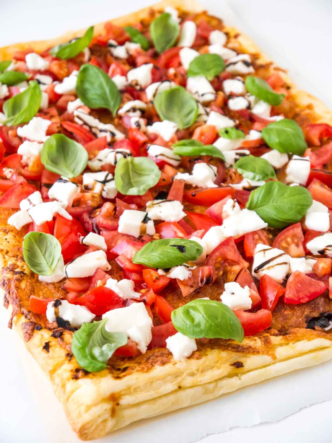 Tomato Mozzarella Puff Pastry Pizza - Plated Cravings